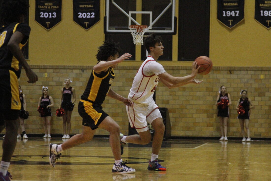 LHS boys basketball wins first game of Topeka Tournament 72-67 over ...